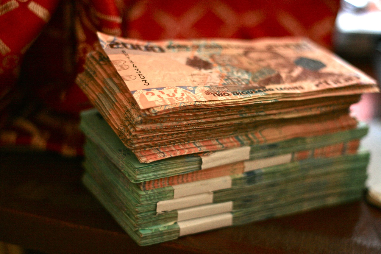 Here's Your Three Million Leones. Yes, I Want Change. | Pulitzer Center